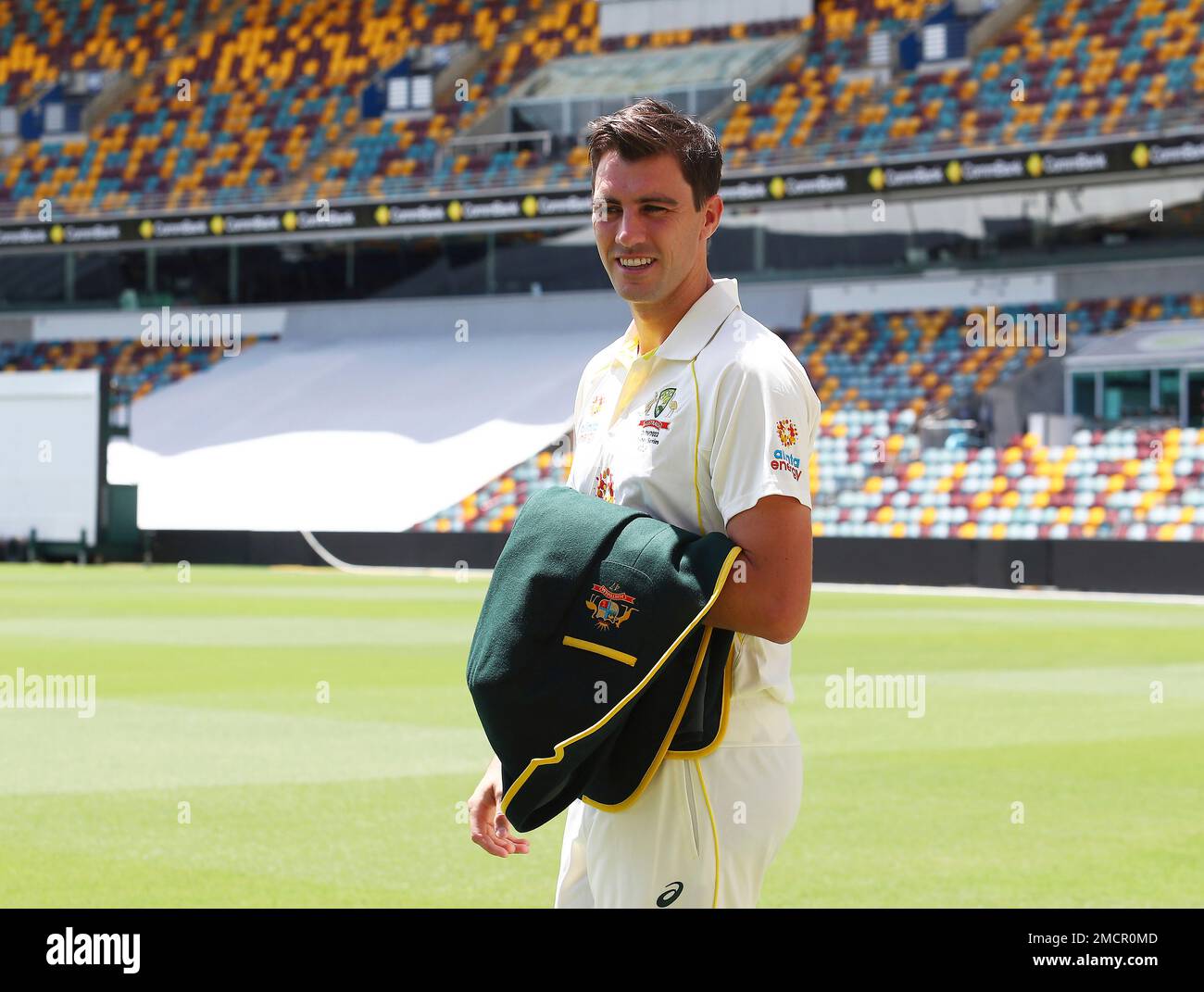 Australian captain Pat Cummins waits on the field after posing with the ...