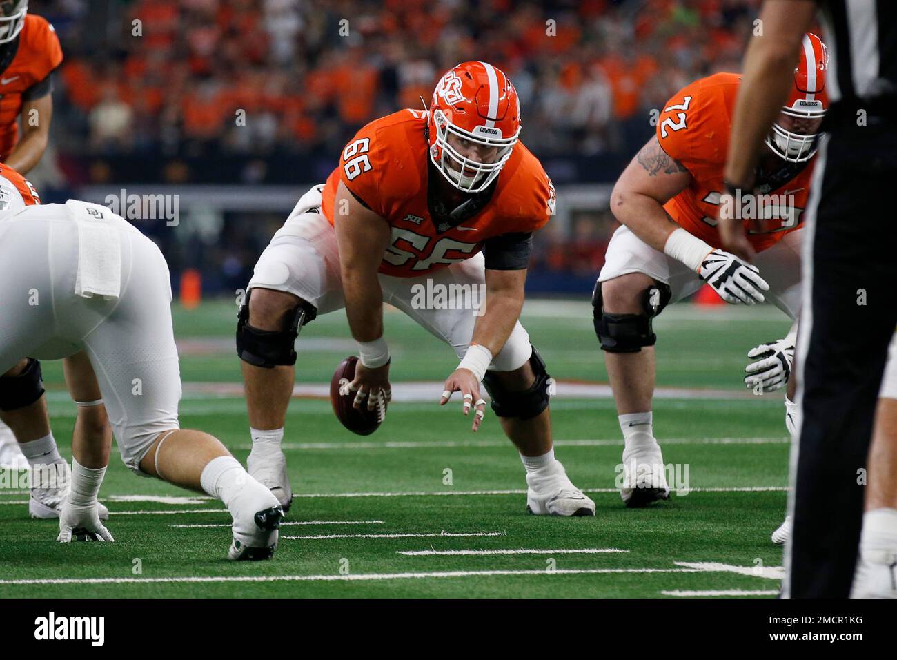 Oklahoma State offensive lineman Joe Michalski (66) snaps the ball during the first half of the ...