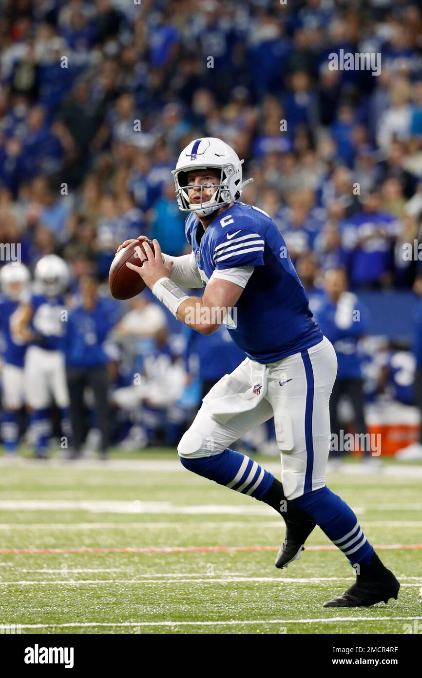 Indianapolis Colts quarterback Carson Wentz rolls out against the Tampa ...