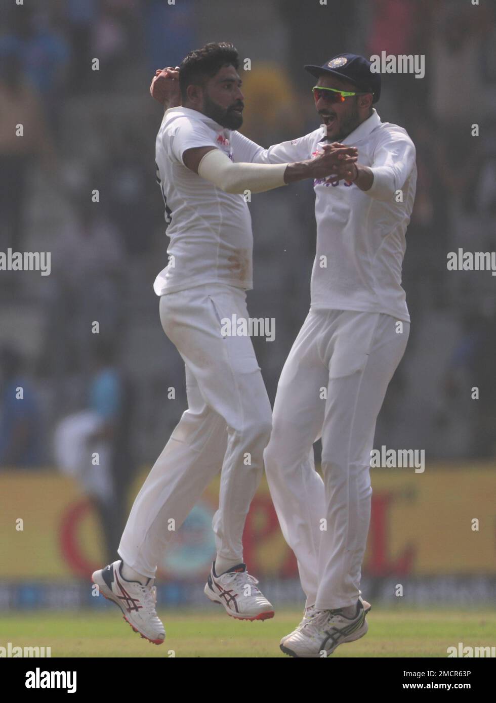 India's Mohammed Siraj, left, celebrates the dismissal of New Zealand's ...