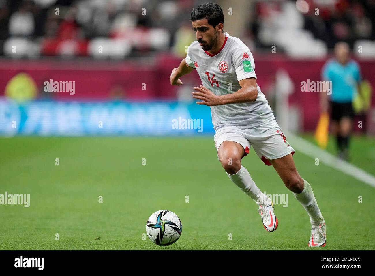 Tunisia's Mohamed Ben Hmida is in action during the group B Arab Cup soccer match between Syria ...