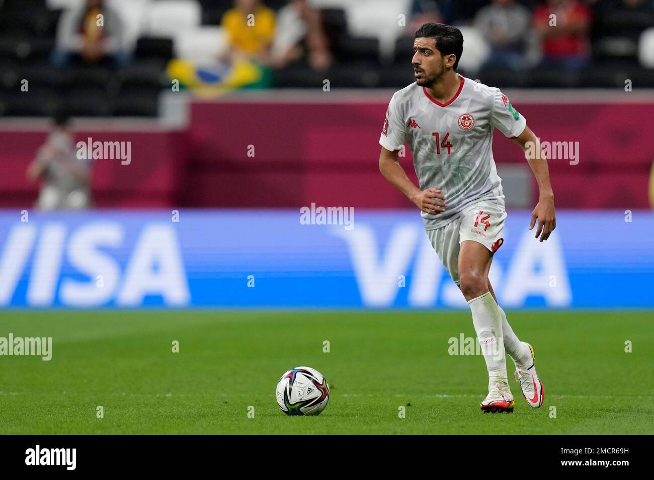 Tunisia's Mohamed Ben Hmida is in action during the group B Arab Cup soccer match between Syria ...
