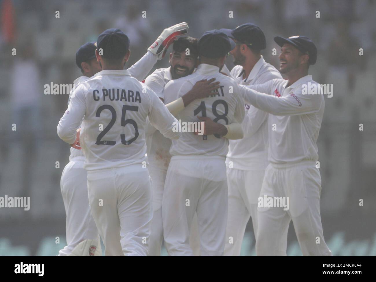 India's Mohammed Siraj,center, celebrates the dismissal of New Zealand ...