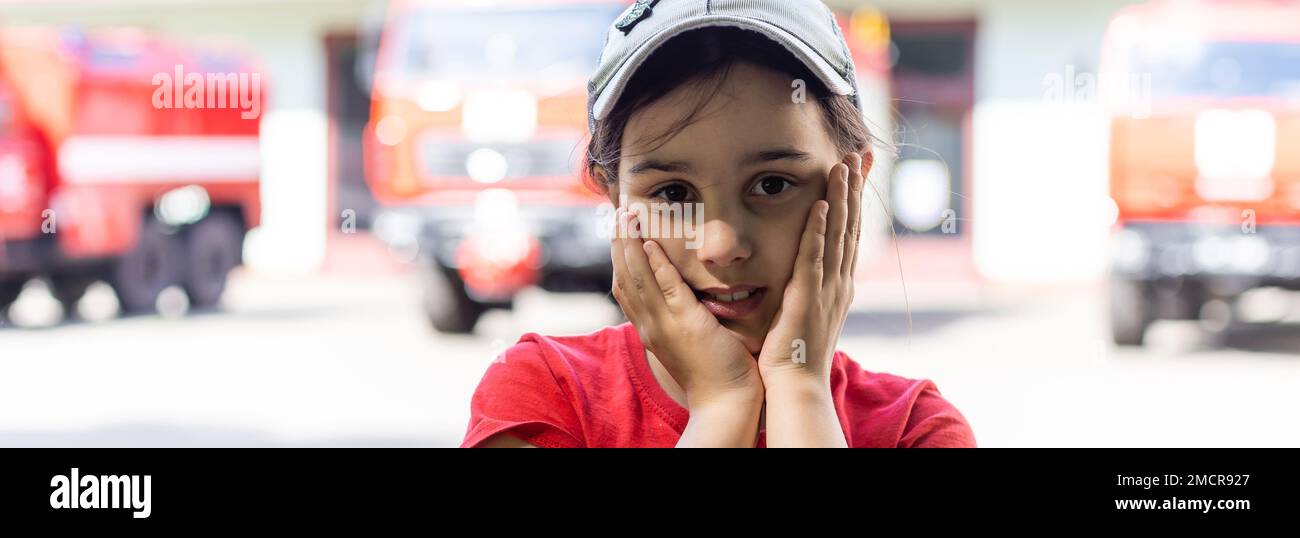 little kid near red fire truck Stock Photo - Alamy