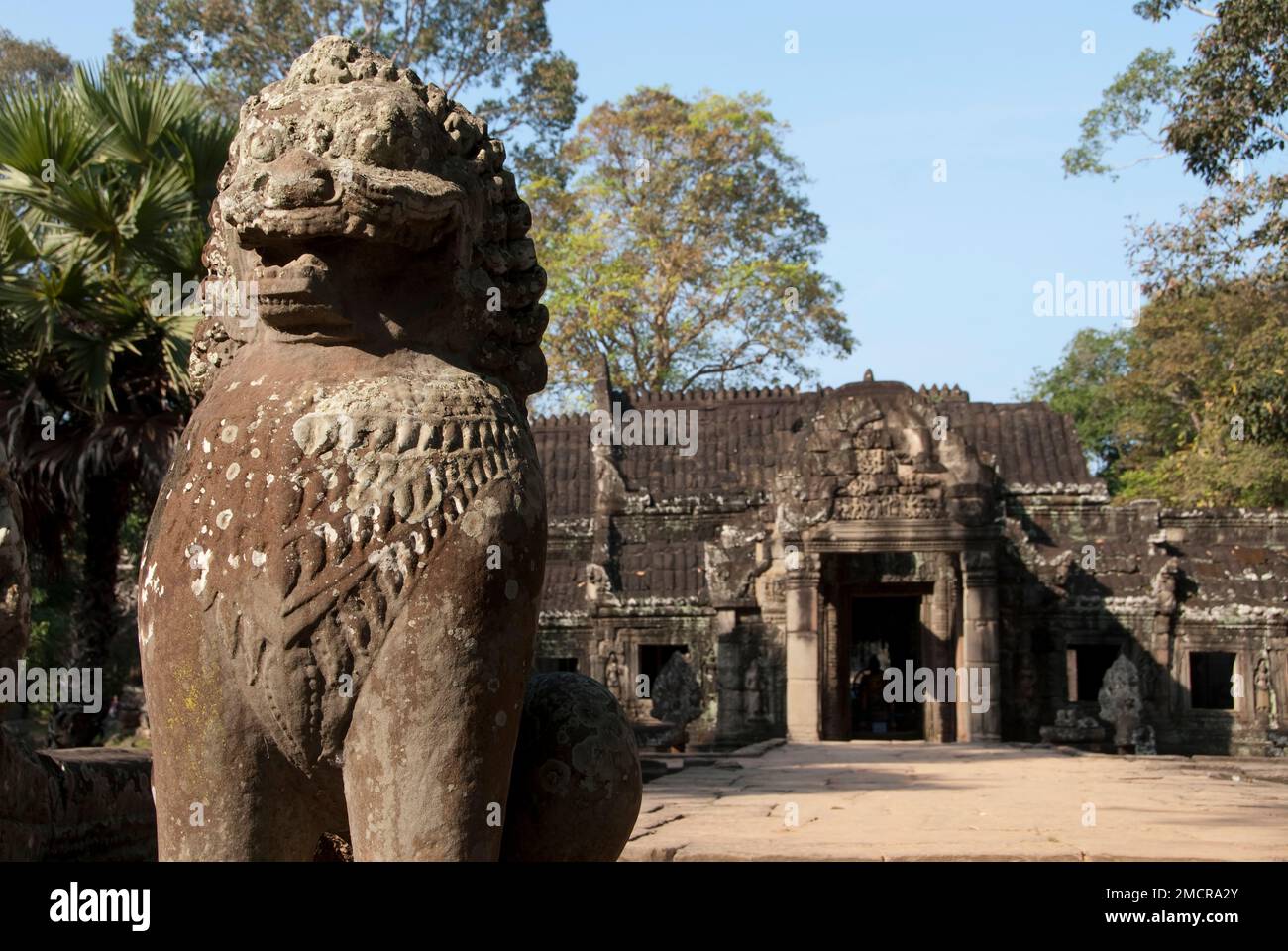 Lion statue outside temple, Ta Prohm temple, Angkor complex, Siem Riep ...