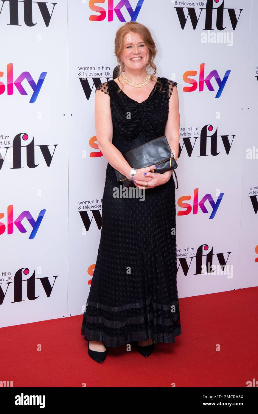 Kate Davis poses for photographers upon arrival at the Women in Film ...