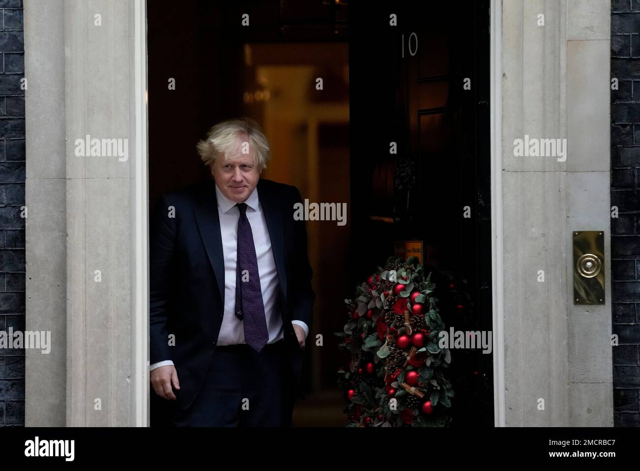 British Prime Minister Boris Johnson walks outside to greet the Sultan ...