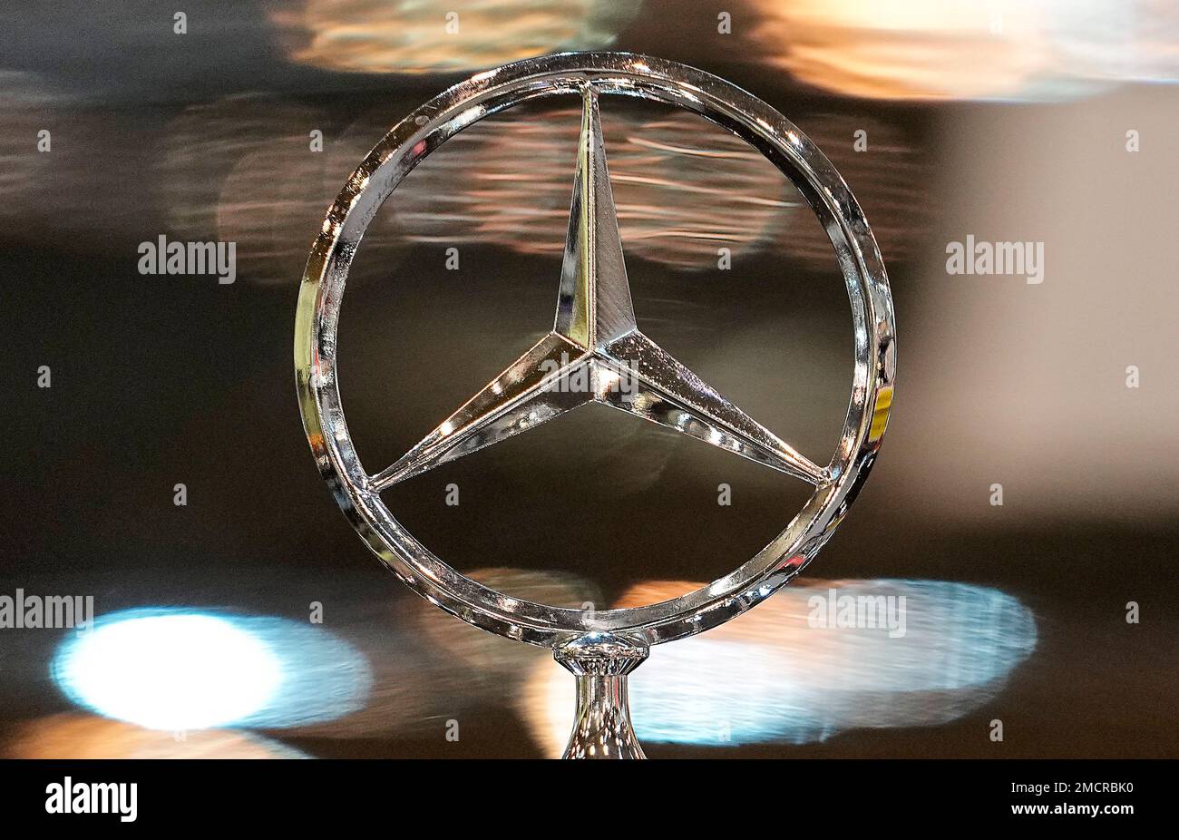 The traditional star hood ornament of Mercedes Benz is pictured on a ...