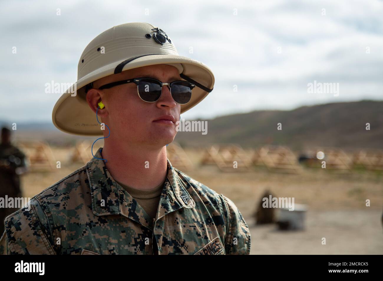 U.S. Marine Corps Cpl. Ian Jennings, a range coach with 5th Battalion ...