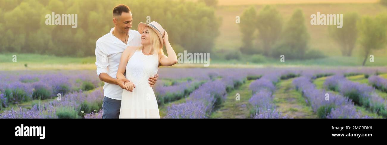 Couple in lavender field. Couple in hug Stock Photo - Alamy