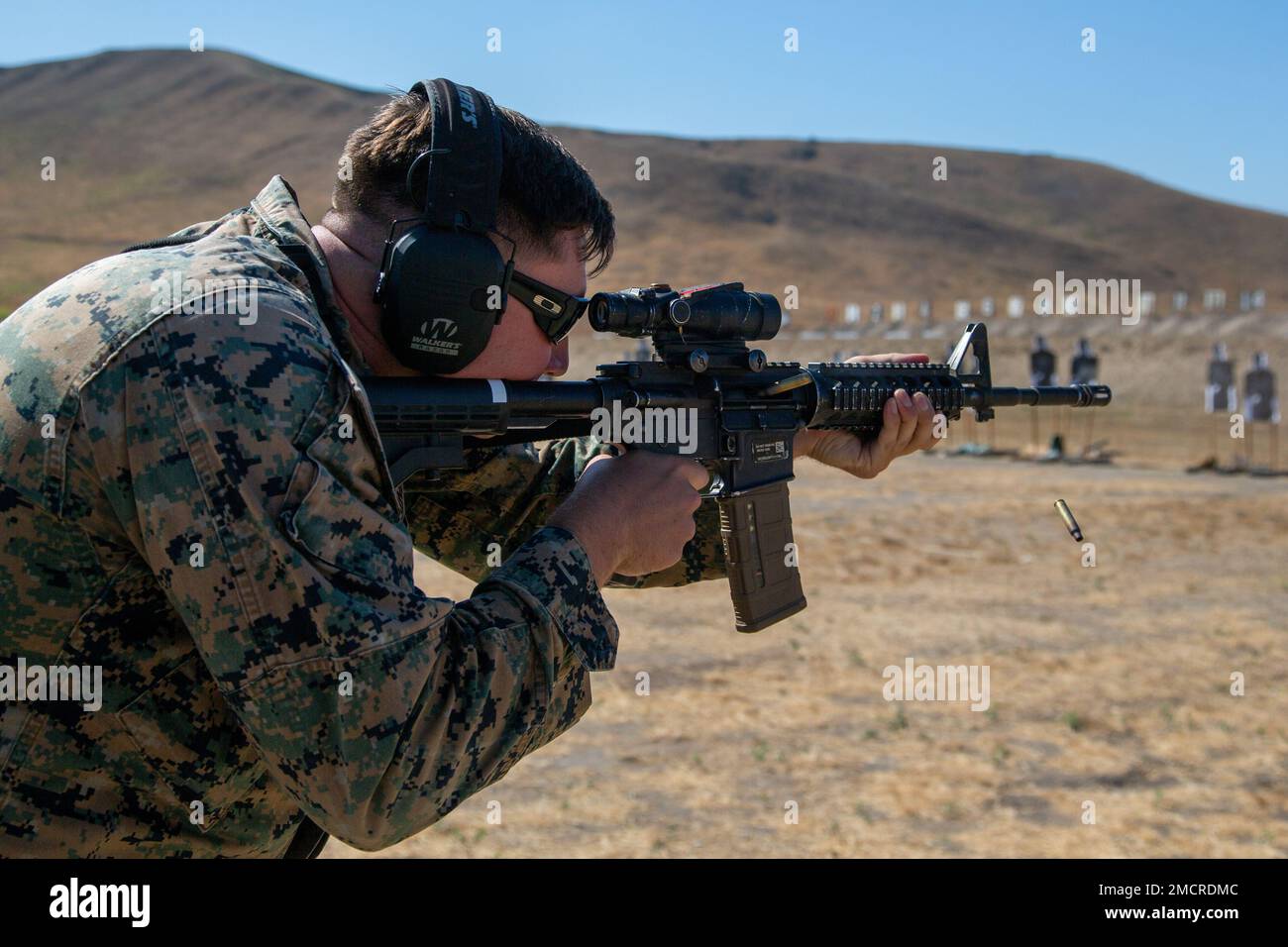 U.S. Marine Corps Sgt. Thomas J. Digiacomo, a range coach with Weapons ...