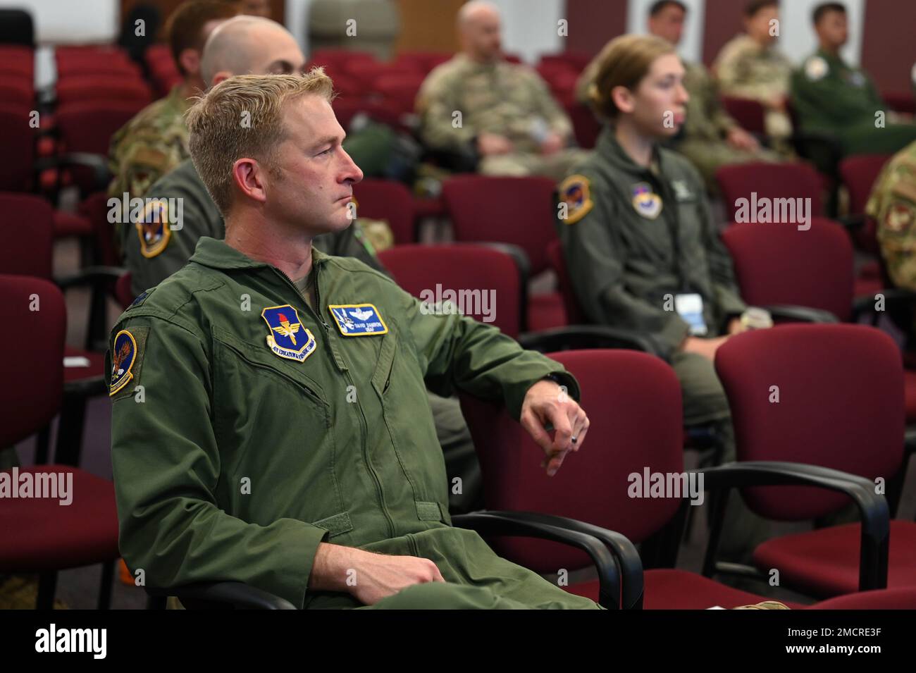 Lt. Col. David Damron, 58th Training Squadron commander, listens to a ...