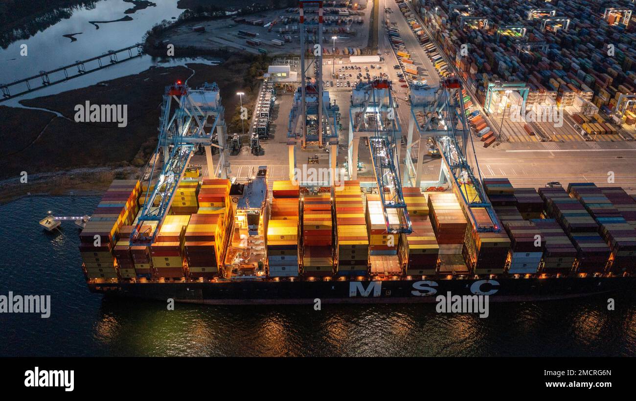 The Mediterranean Shipping Company ship MSC Meline, front, is in the ...