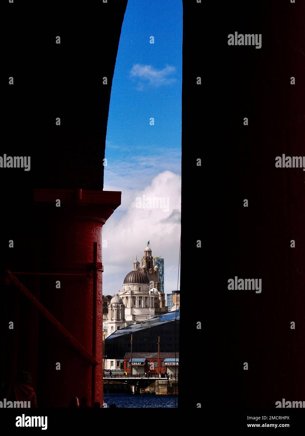 The Liver Building as seen through the imposing red painted columns of ...