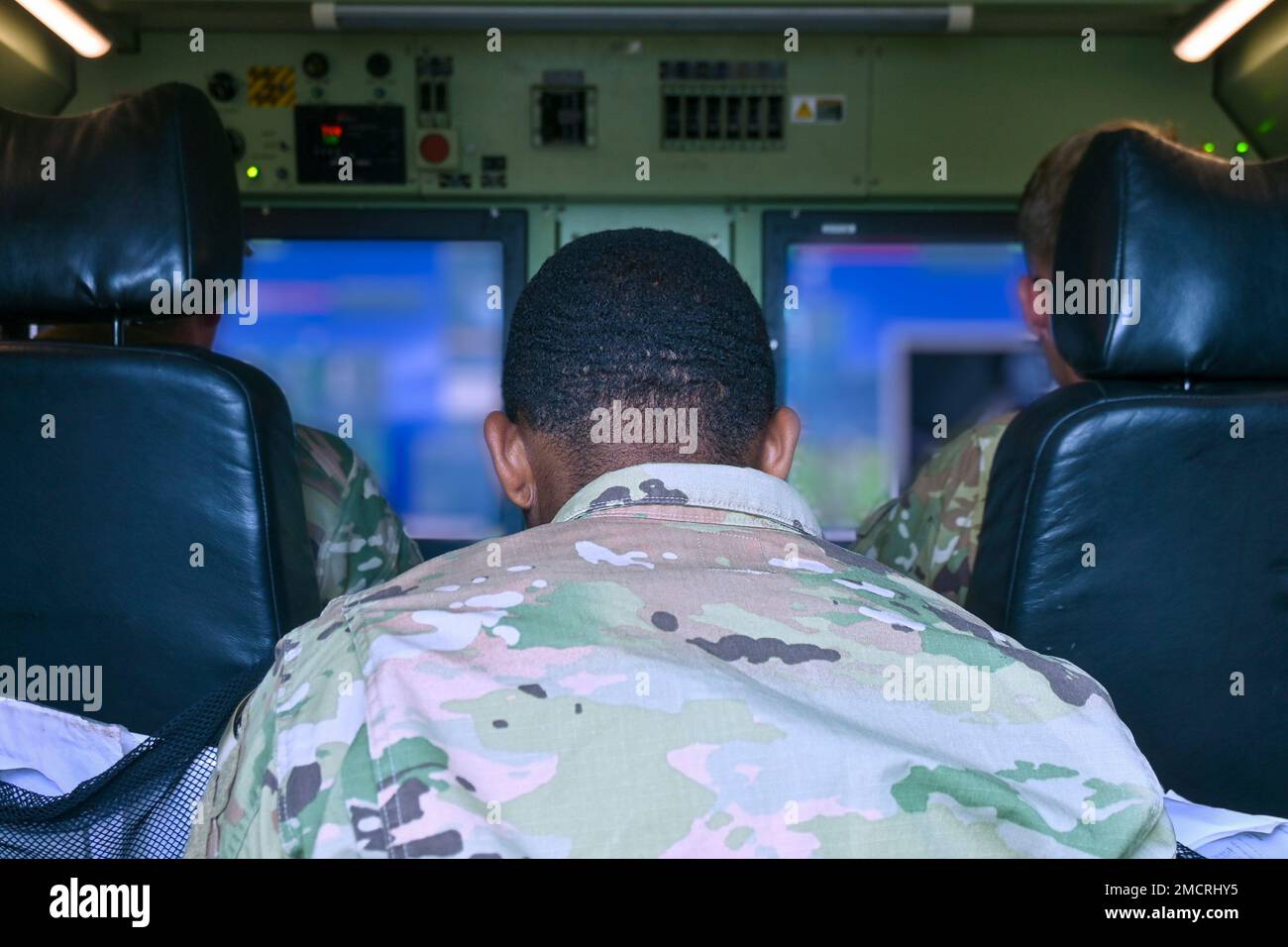 U.S. Army Spc. Robert Schumaker, left, a Columbus, IN native and ...