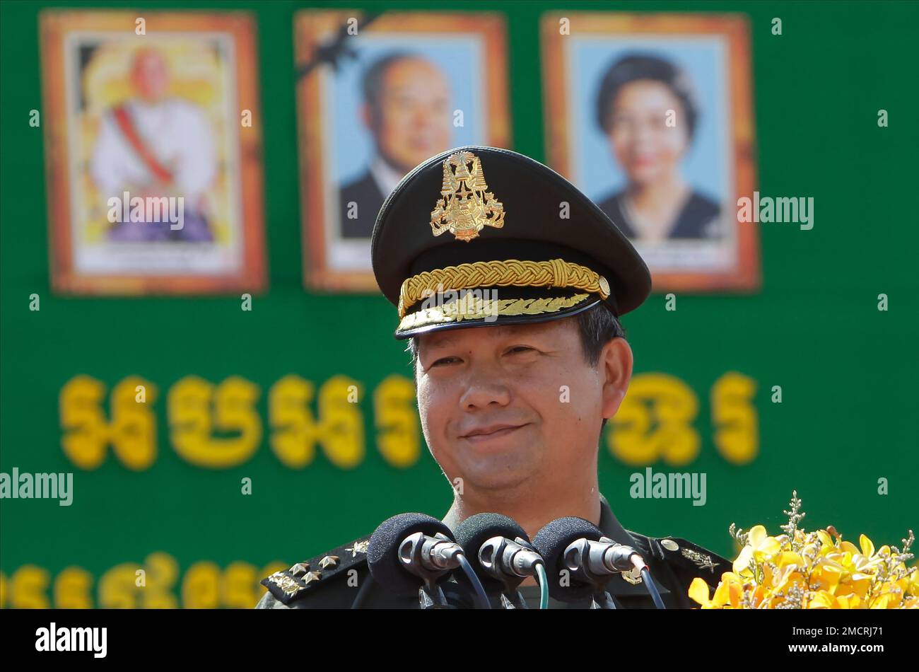 Son of Cambodian Prime Minister Hun Sen, Lt. Gen. Hun Manet smiles as ...