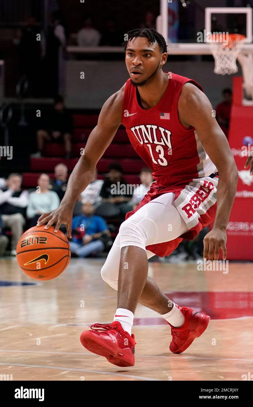UNLV guard Bryce Hamilton (13) handles the ball during an NCAA college ...