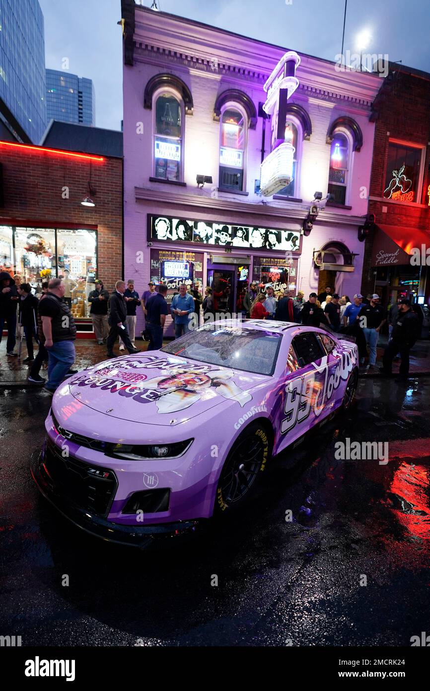 A NASCAR race car sponsored by Tootsie's Orchid Lounge sits outside the ...
