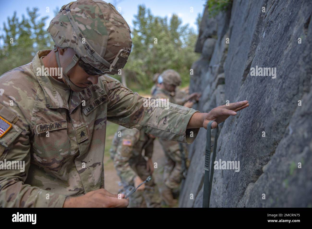 Sgt. Brenner Norman, 11th Airborne Division, studies how to place ...