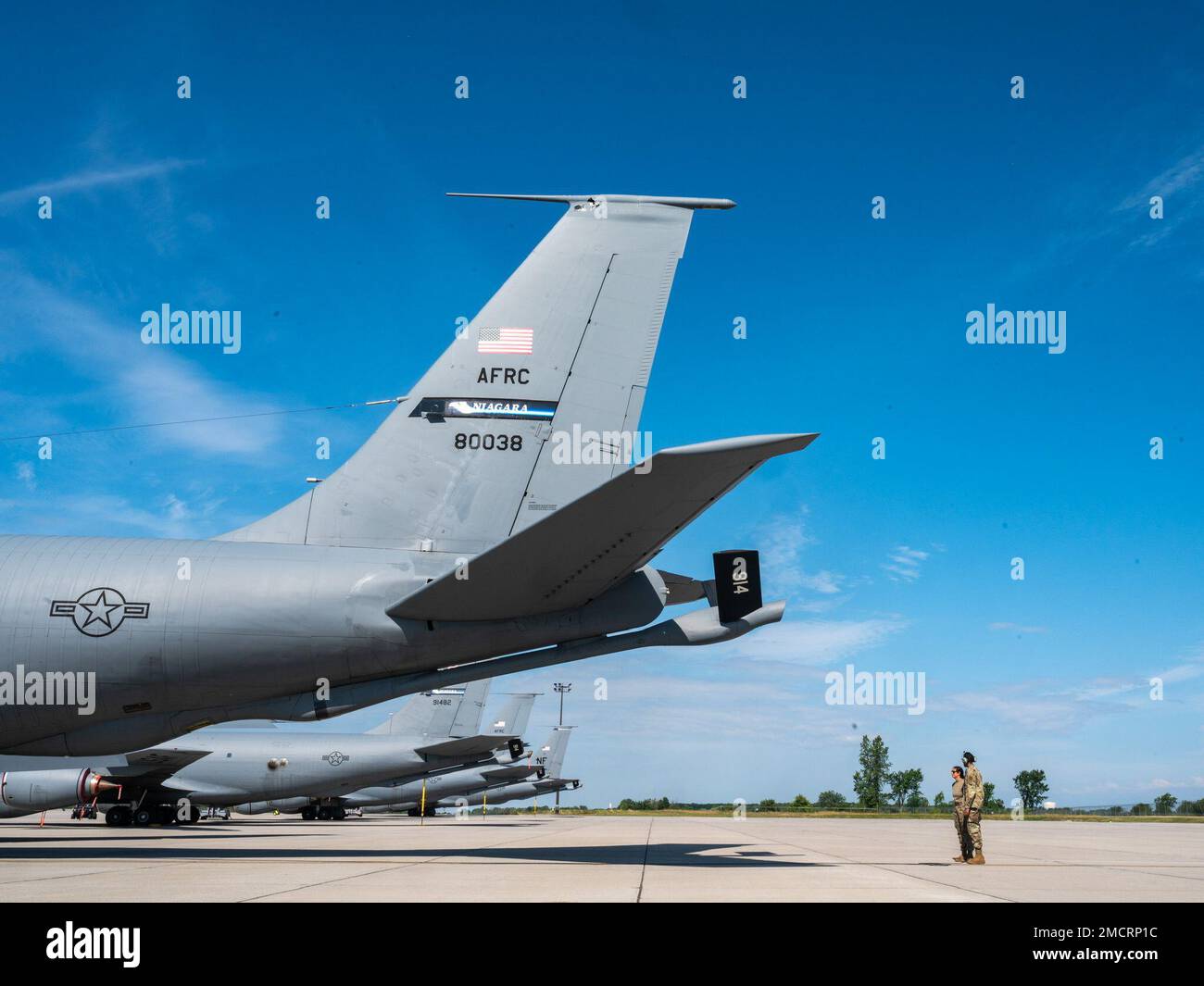 U.S. Air Force crew chiefs with the 914th Air Refueling Wing, New York, inspect the back of a KC ...