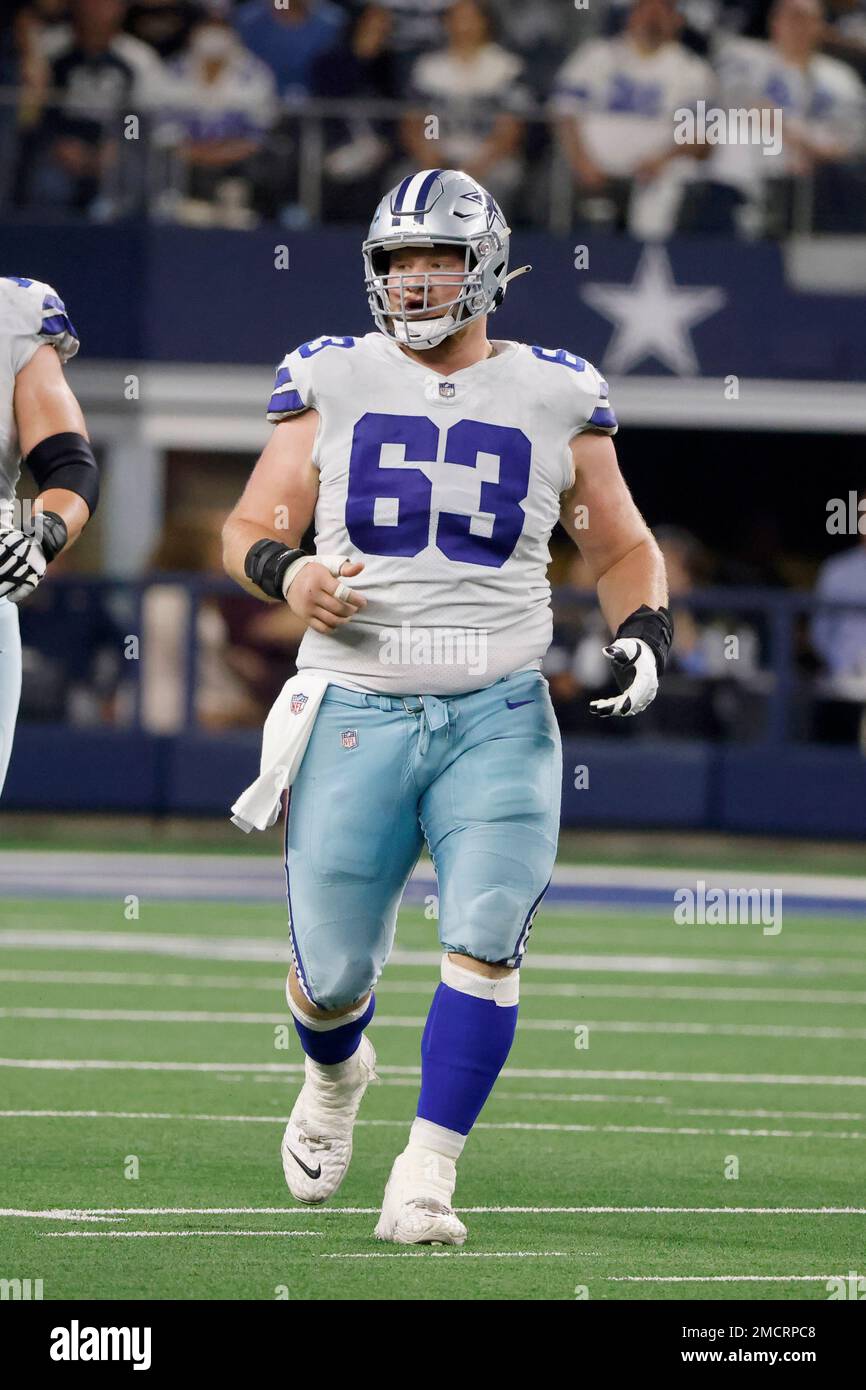 Dallas Cowboys center Tyler Biadasz (63) walks onto the field during an ...