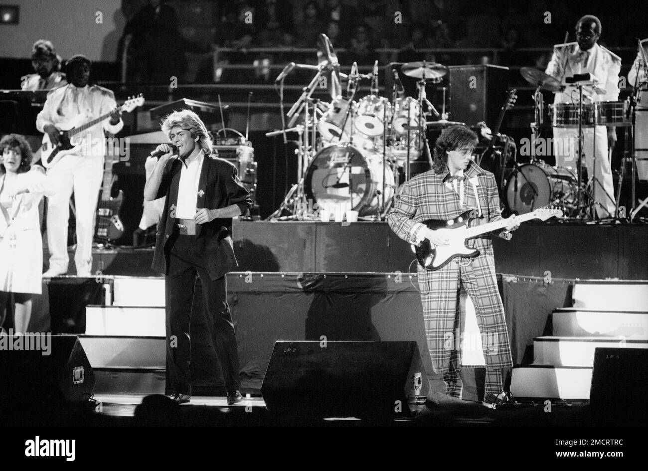 British pop duo Wham! performs on stage in Peking, April 7, 1985. The ...