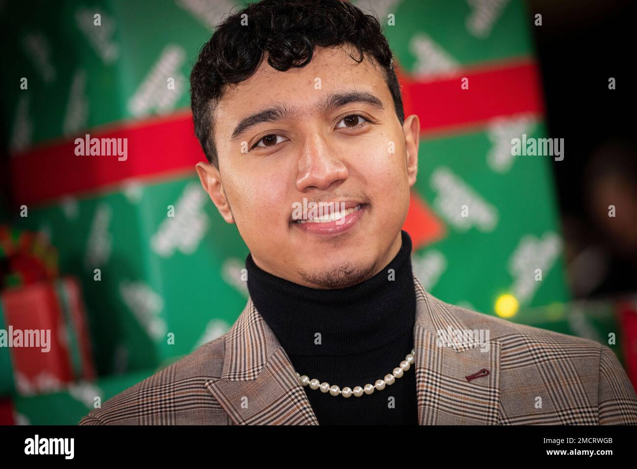 Reda Elazouar poses for photographers upon arrival at the premiere of ...