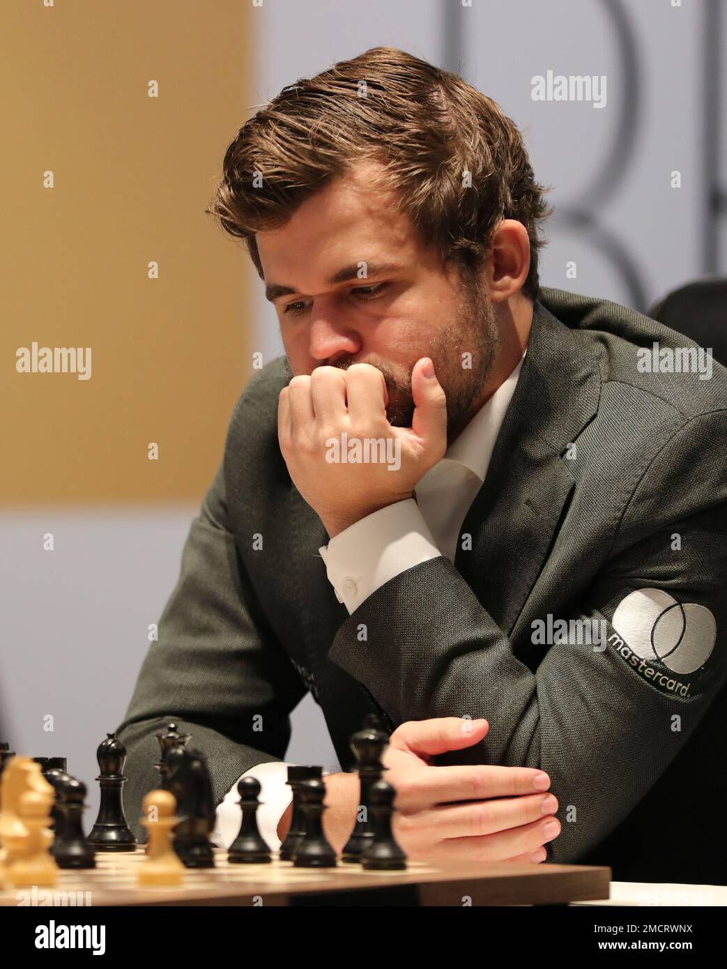 Norway's World Chess Champion Magnus Carlsen, takes a moment in game ...