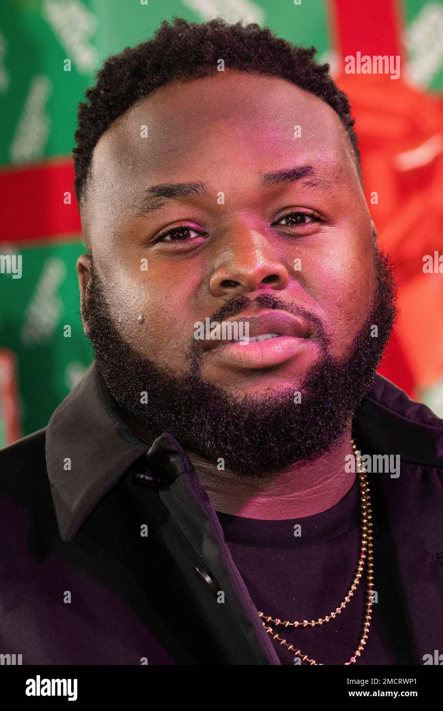 Samson Kayo poses for photographers upon arrival at the premiere of the ...