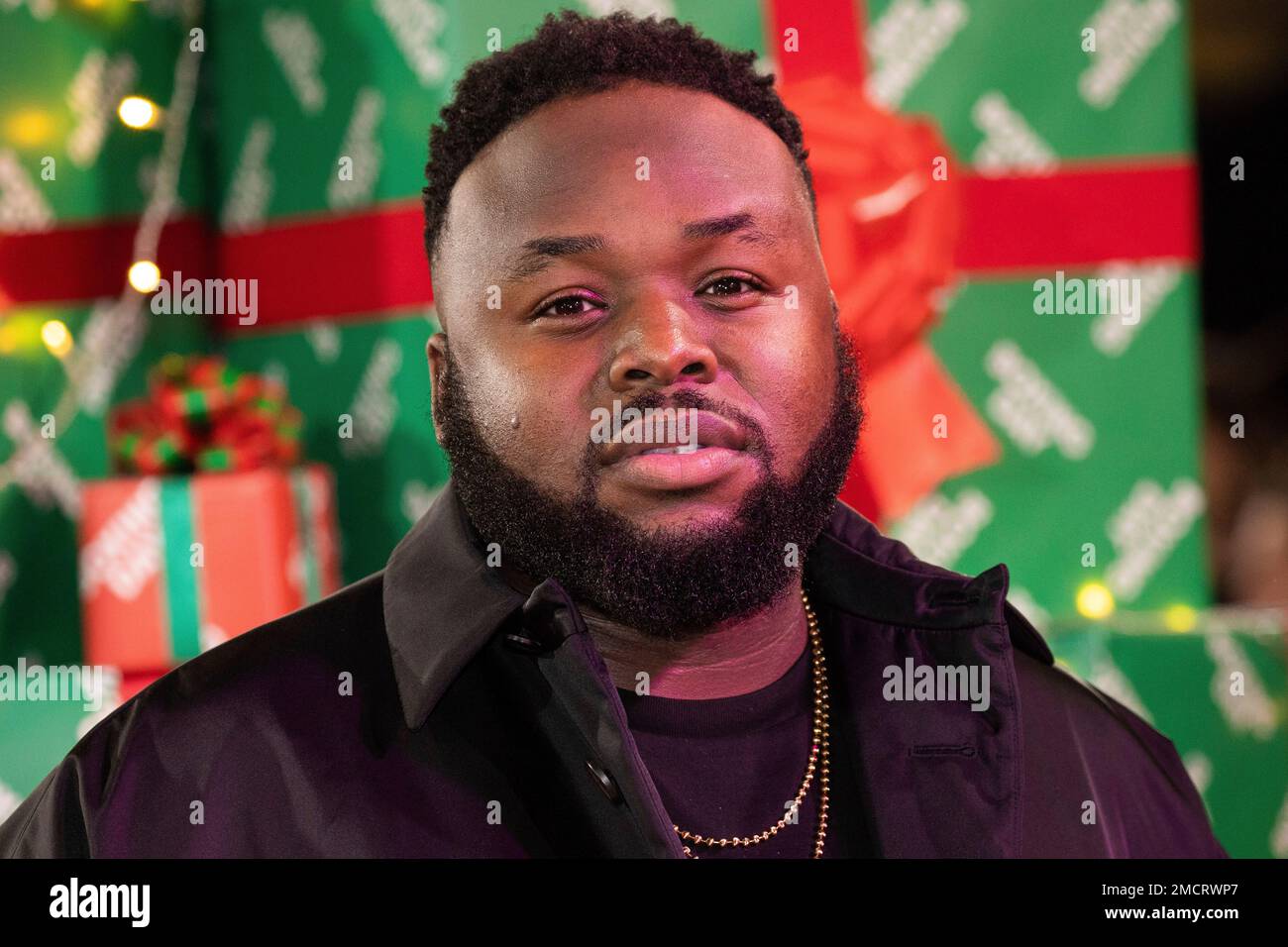 Samson Kayo poses for photographers upon arrival at the premiere of the ...