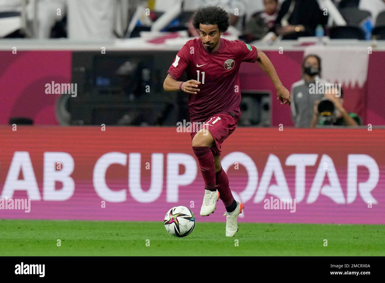 Qatar's Akram Afif is in action during the group A Arab Cup soccer ...