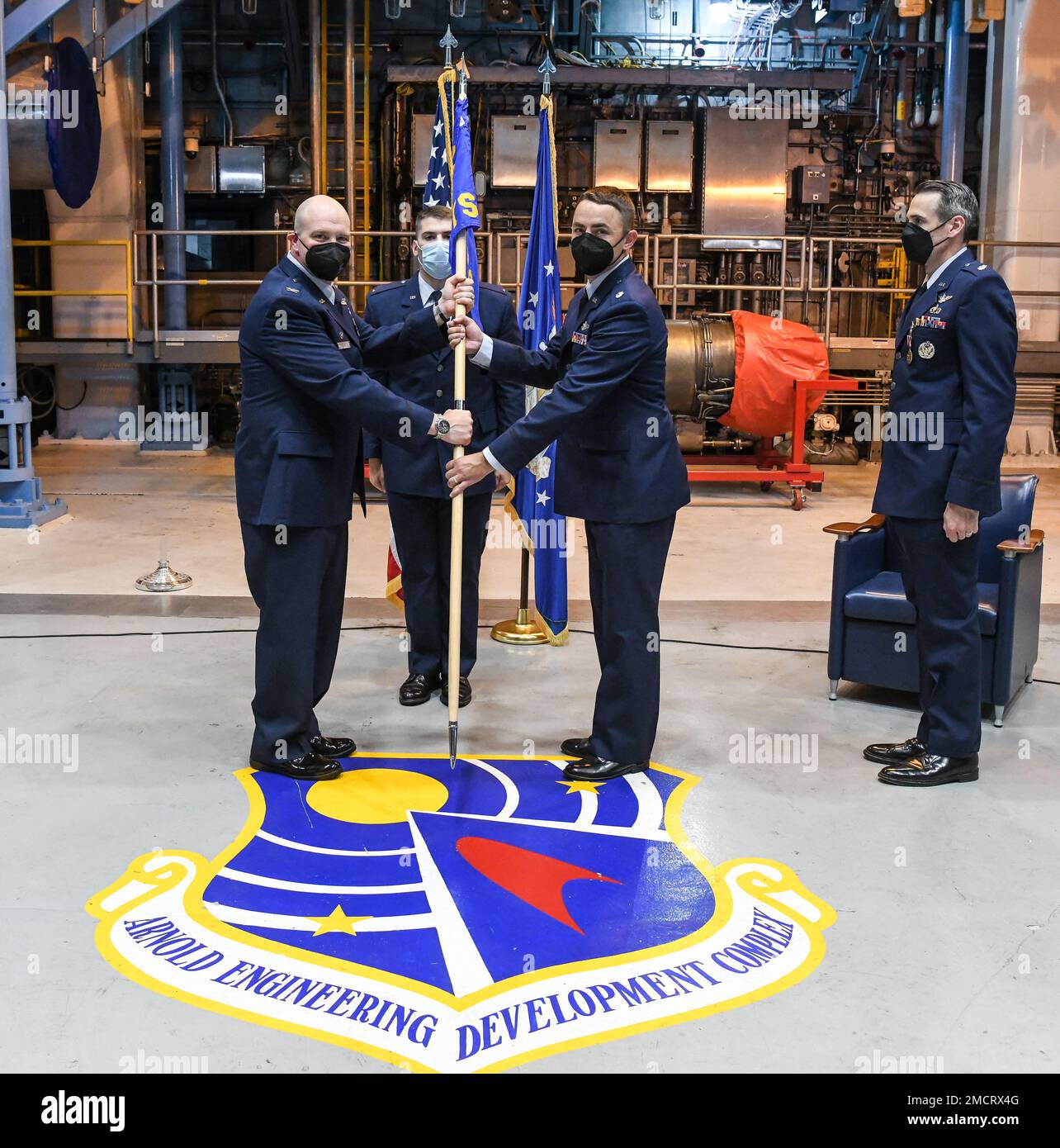 Col. Jason Vap, left, commander, 804th Test Group, passes the 717th ...