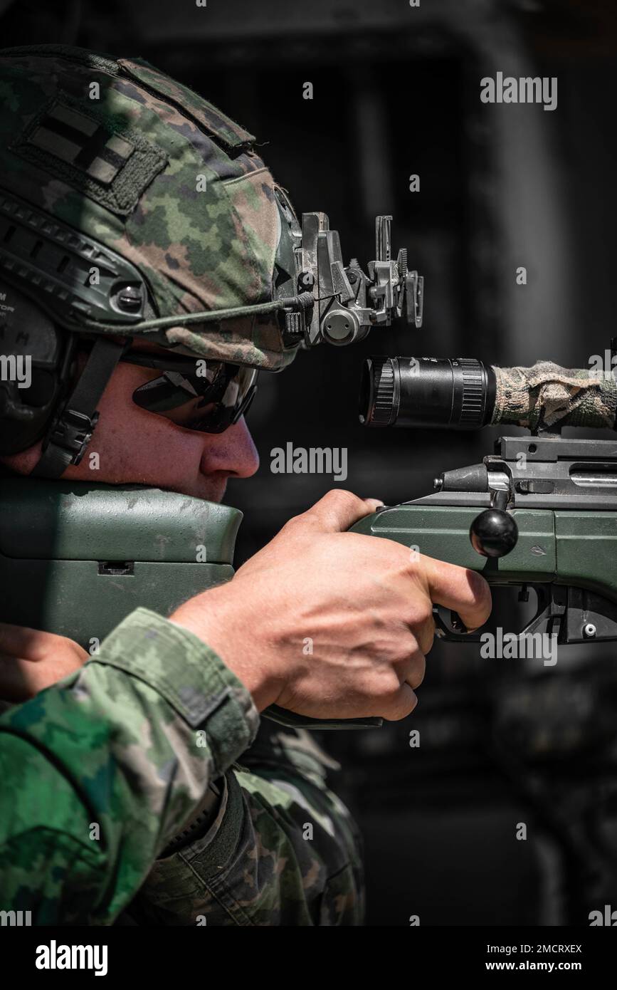 A sniper from the Finnish Army takes a shot during the European Best ...