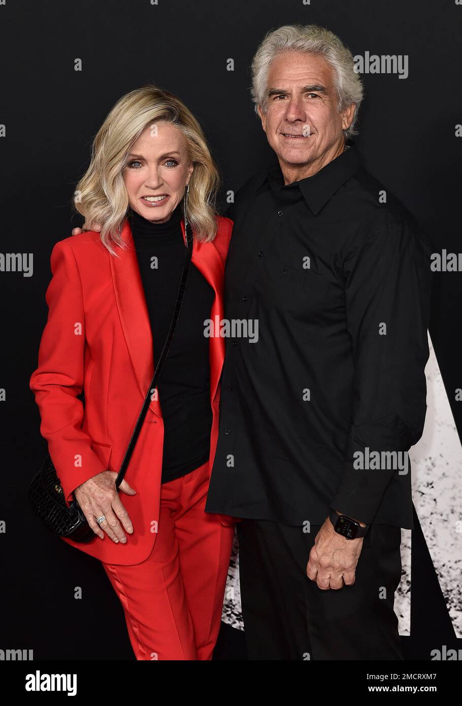 Donna Mills, left, and Larry Gilman arrive at the Los Angeles premiere ...
