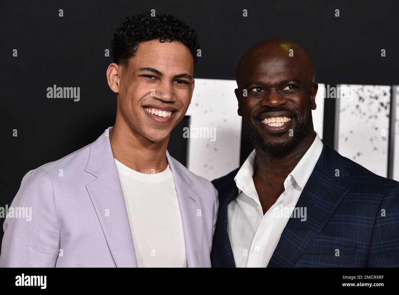Jude Wilson and Garfield Wilson arrive at the Los Angeles premiere of "The Unforgivable" at the ...