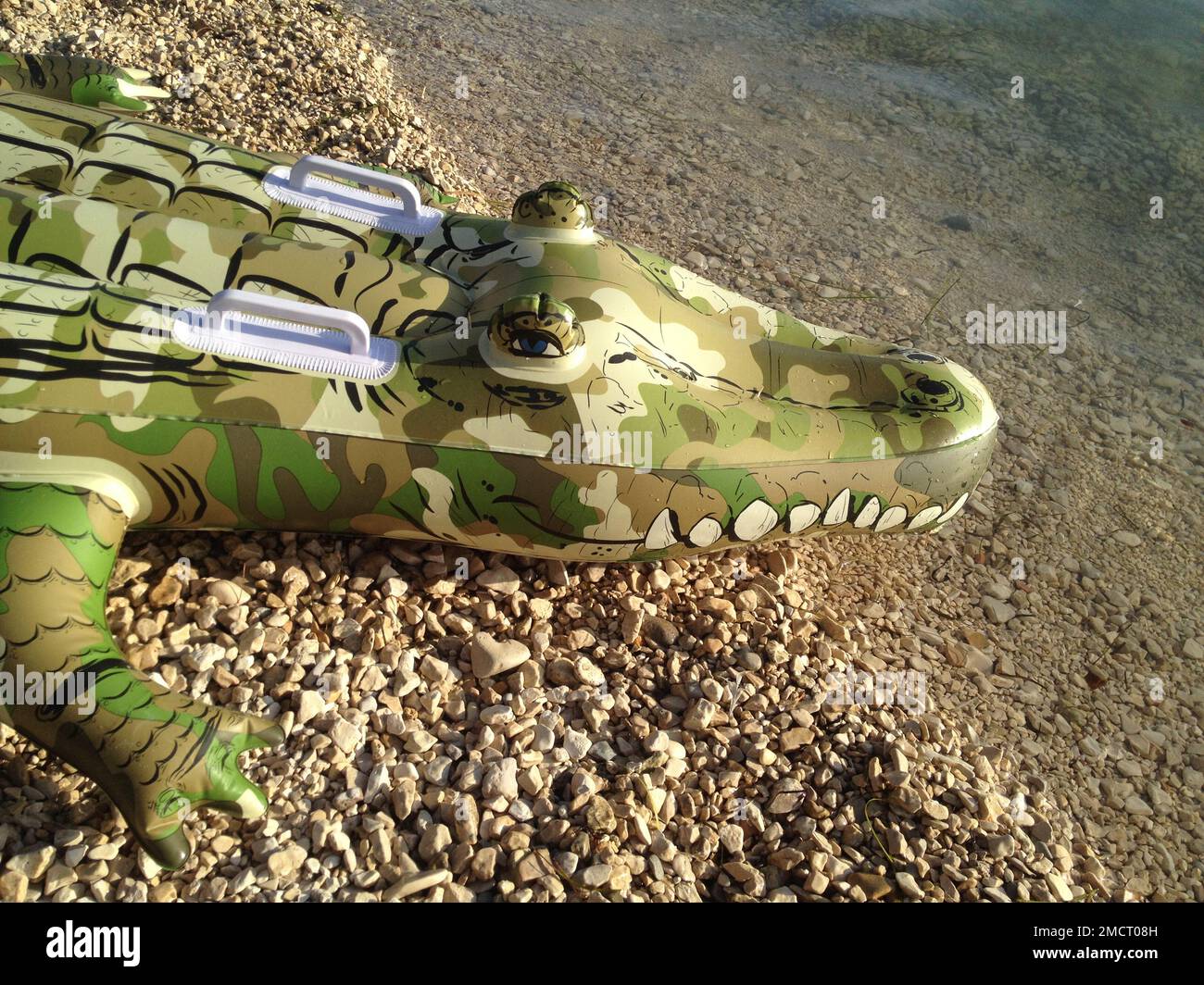 Rubber crocodile on the beach hi-res stock photography and images - Alamy