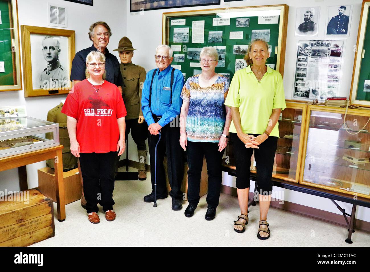 McCoy family members stand next to a wooden crate more than a century ...