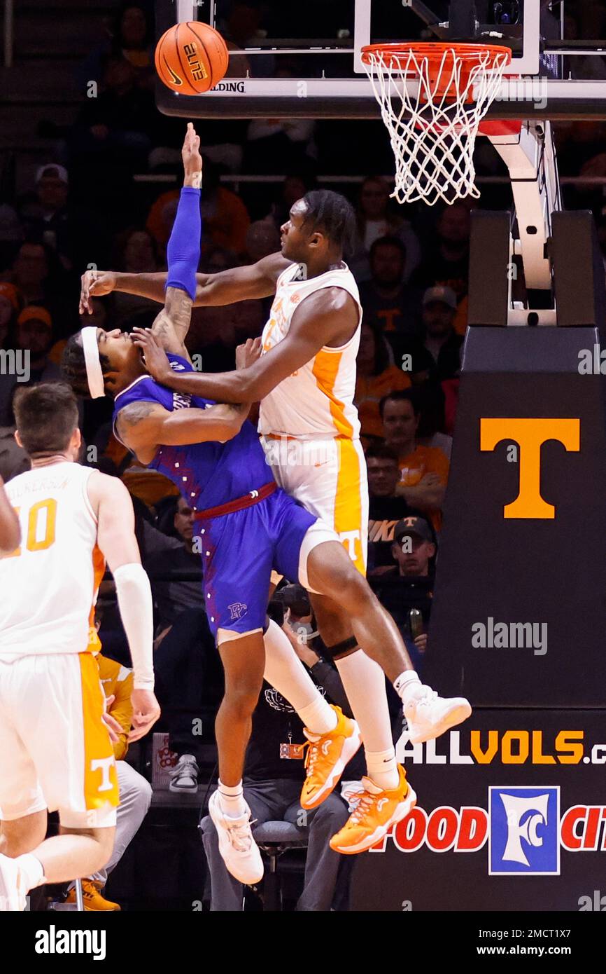 Tennessee forward Brandon Huntley-Hatfield (2) fouls Presbyterian guard ...