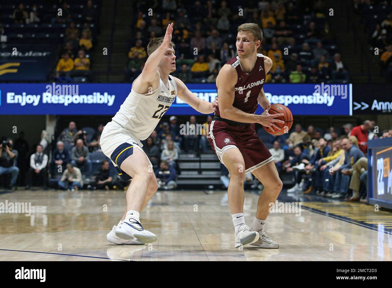 Bellarmine guard Juston Betz (1) looks to pass as West Virginia guard ...
