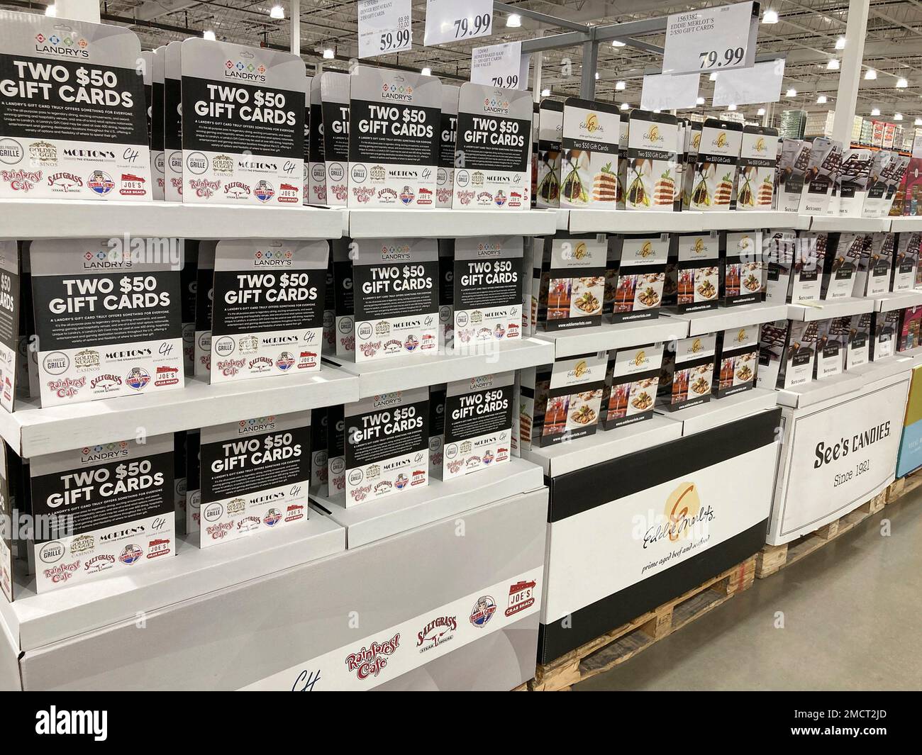 A display of gift cards stands on display in a Costco warehouse Monday ...