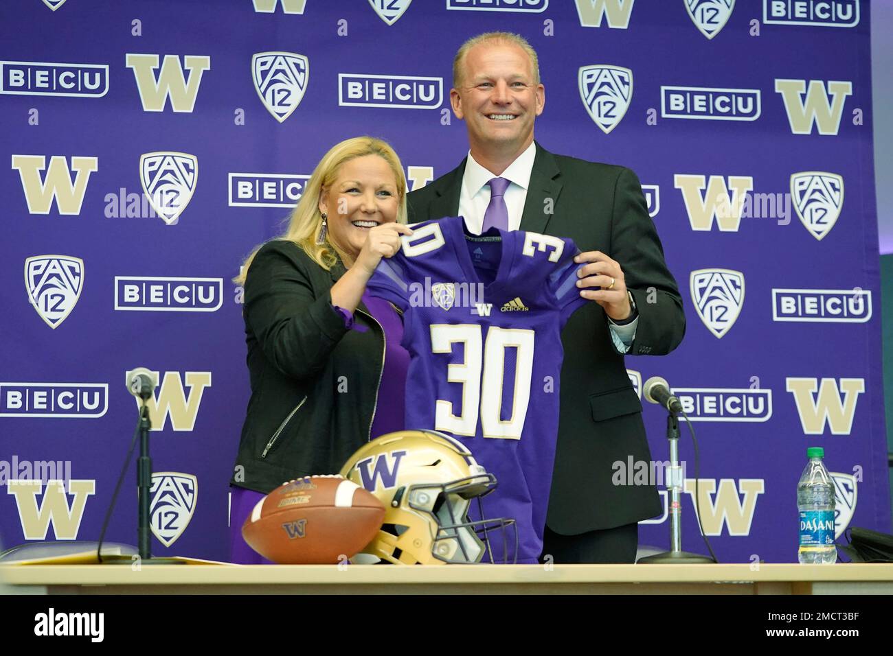 Washington athletic director Jen Cohen, left, poses for a photo with ...