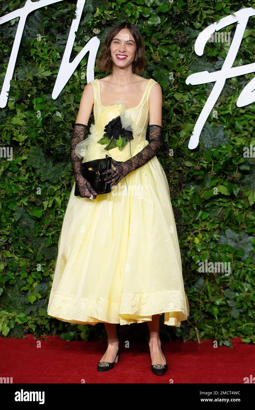 Alexa Chung poses for photographers upon arrival at the The Fashion ...