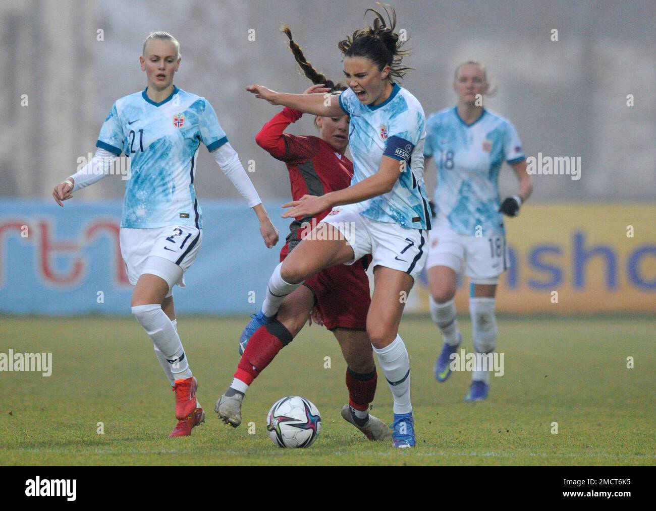 Norway's Ingrid Syrstad Engen, right, fights for the ball with Armenia ...