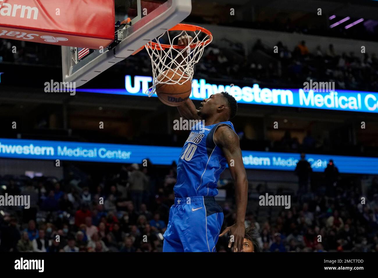 Dallas Mavericks forward Dorian Finney-Smith scores in an NBA ...