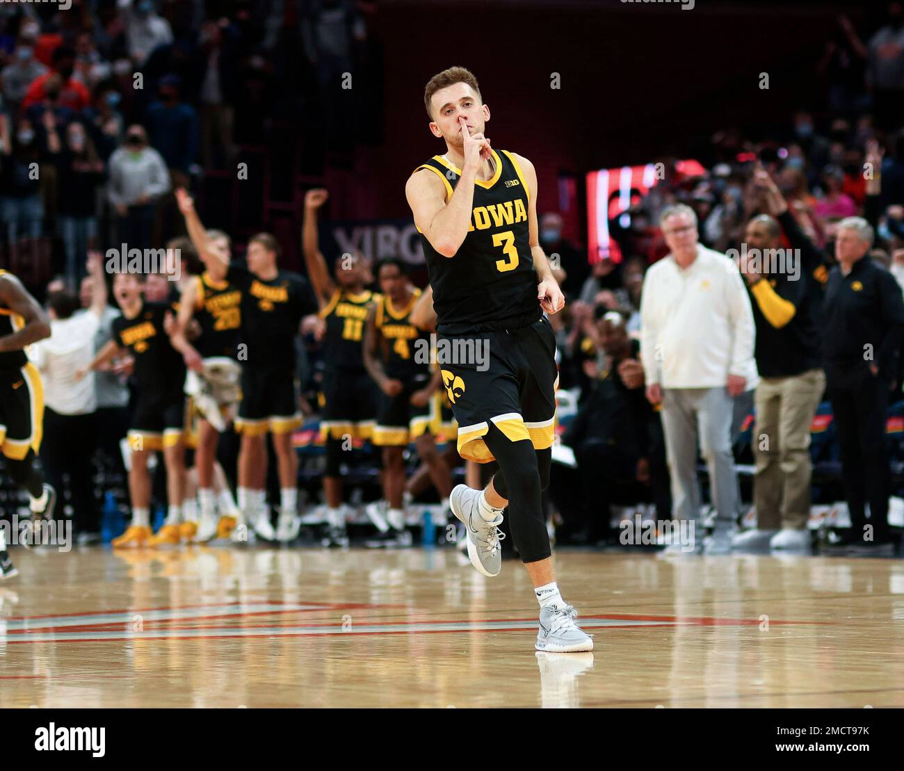 Iowa guard Jordan Bohannon (3) celebrates a 3-point basket during the ...