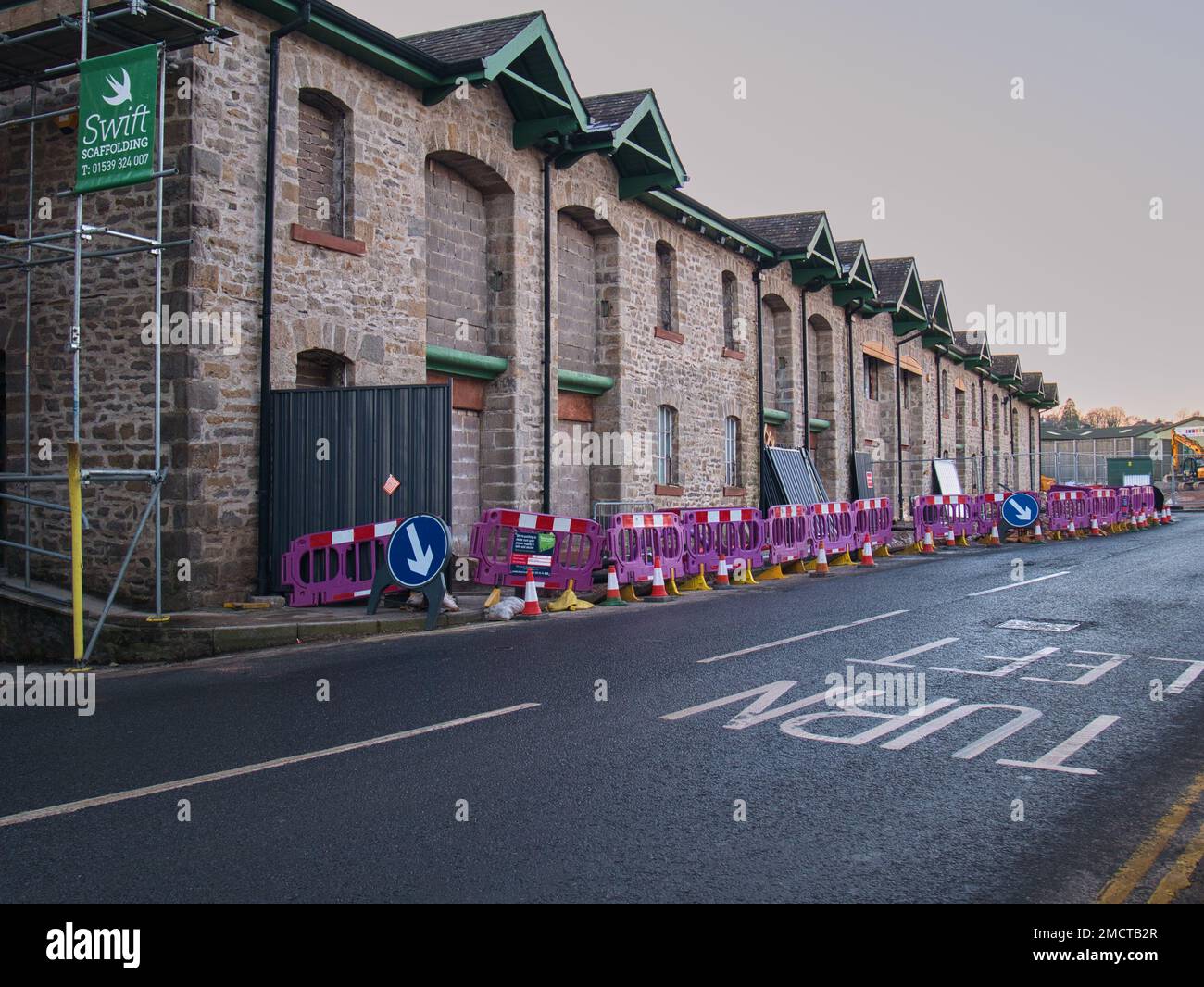 Safety barriers surrounding the old bonded warehouse during its ...