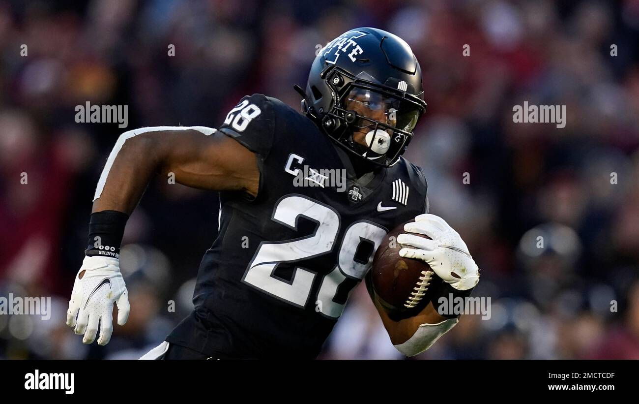 Iowa State running back Breece Hall (28) carries the ball up field ...