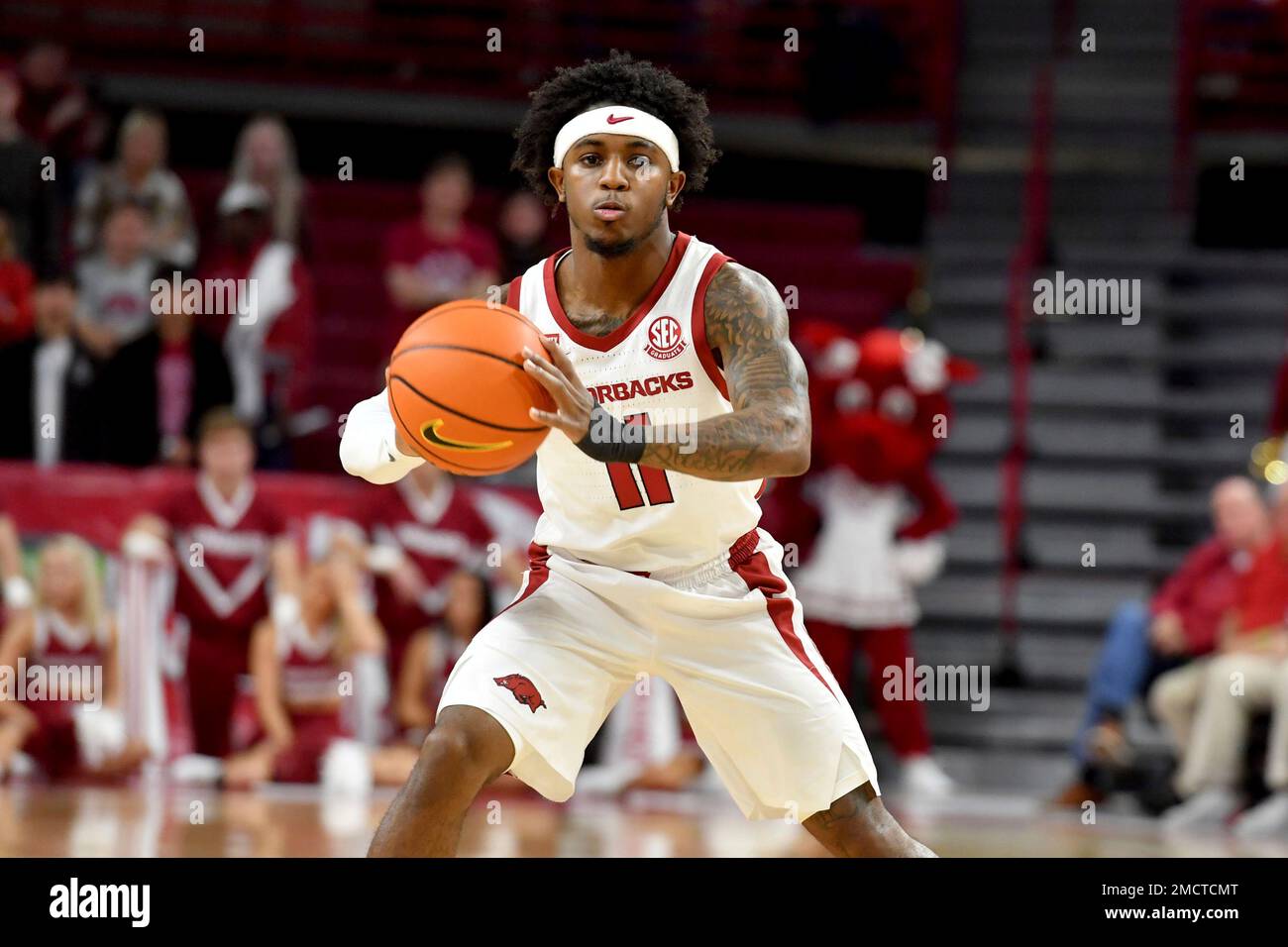 Arkansas guard Chris Lykes (11) against Pennsylvania during an NCAA ...