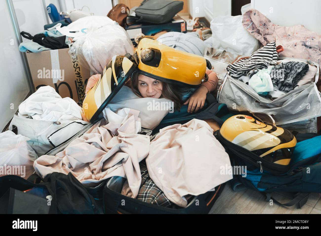 Suitcase packing mess hi-res stock photography and images - Alamy