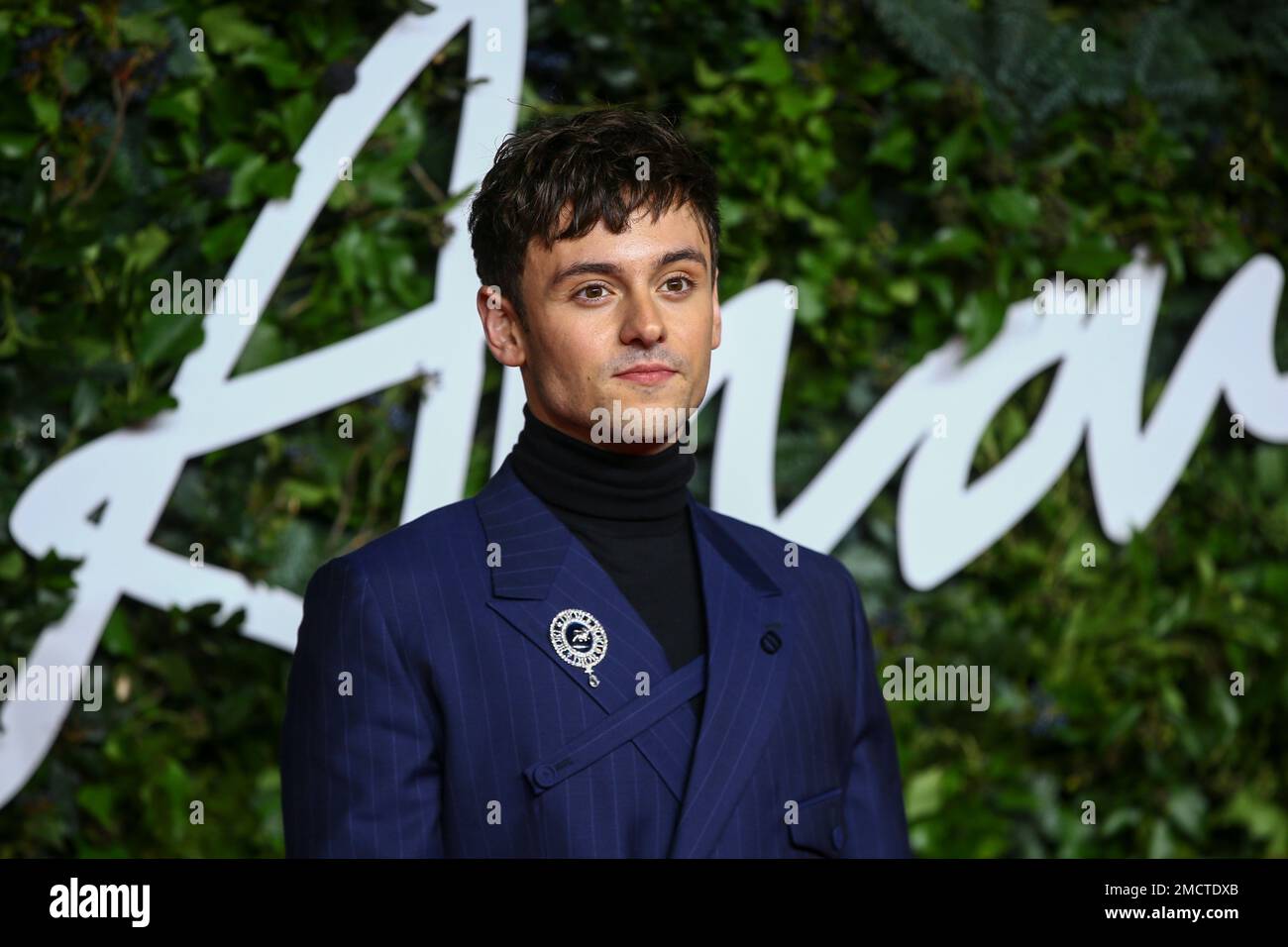Tom Daley poses for photographers upon arrival at the The Fashion ...